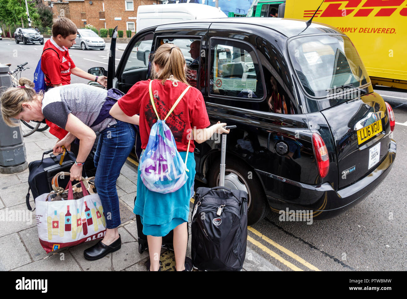 Female black cab hi-res stock photography and images - Alamy