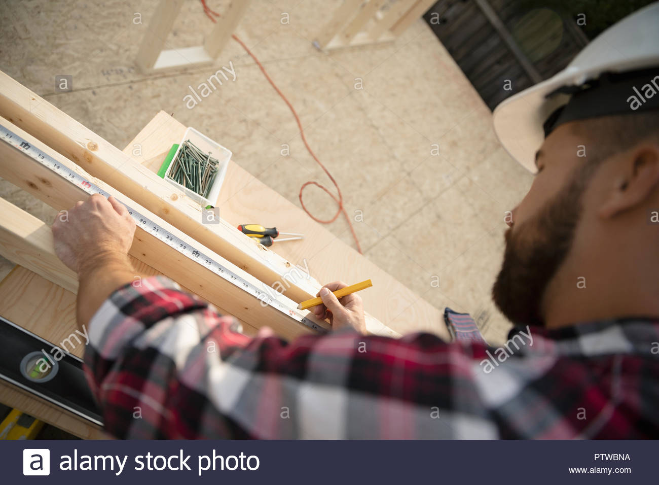 Man holding measuring with pencil hi-res stock photography and images ...