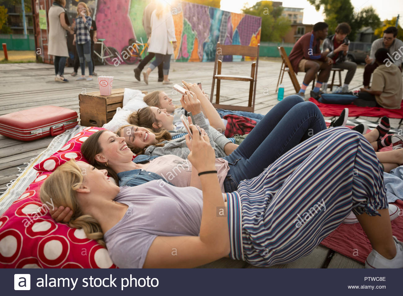 Teenage girl laying in park hi-res stock photography and images - Alamy