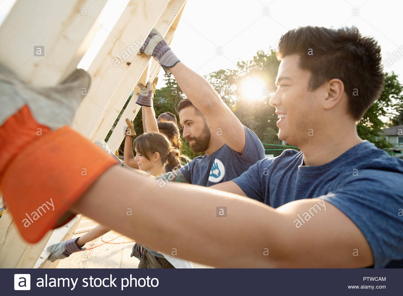 Volunteers building house frame hi-res stock photography and images - Alamy