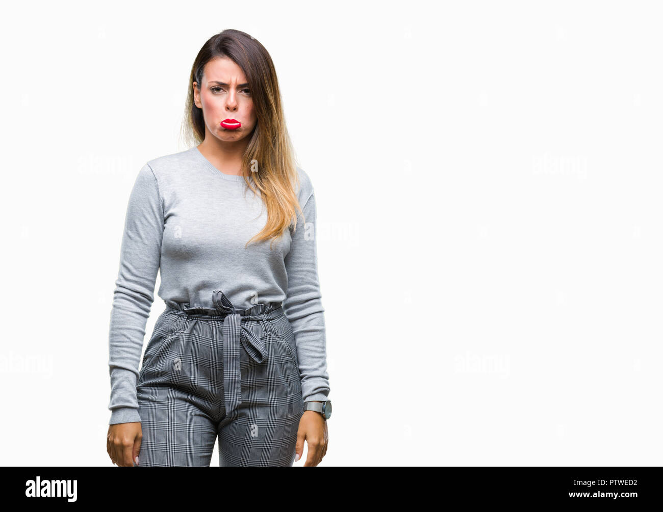 Young beautiful worker business woman over isolated background ...