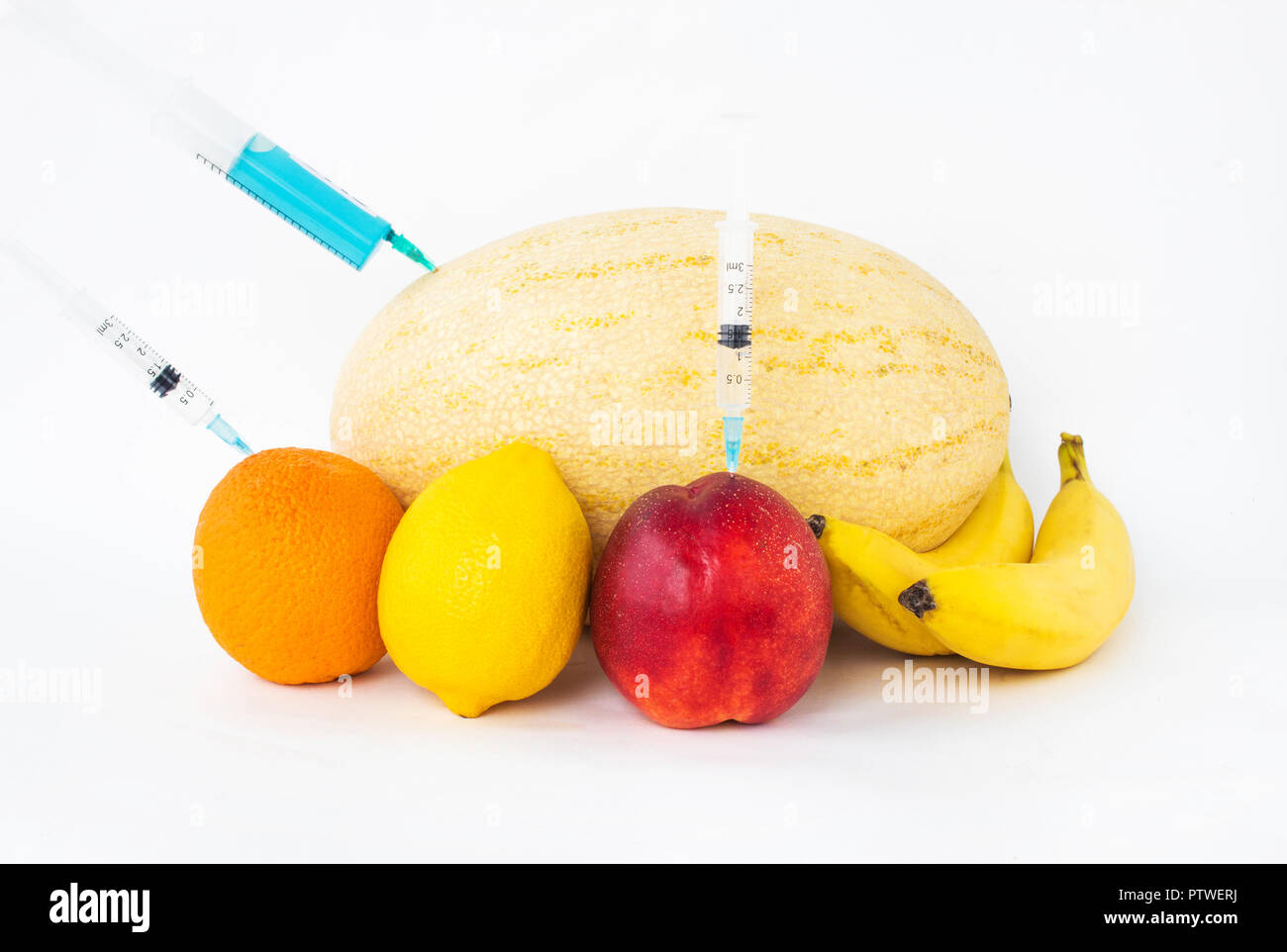 Fruits on a white background bananas, orange, melon, lemon and ...