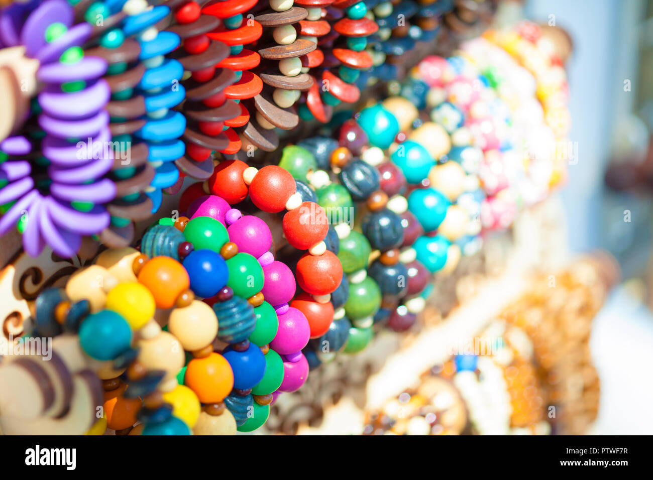 colorful bright beads and bracelets. A saturated background Stock Photo ...