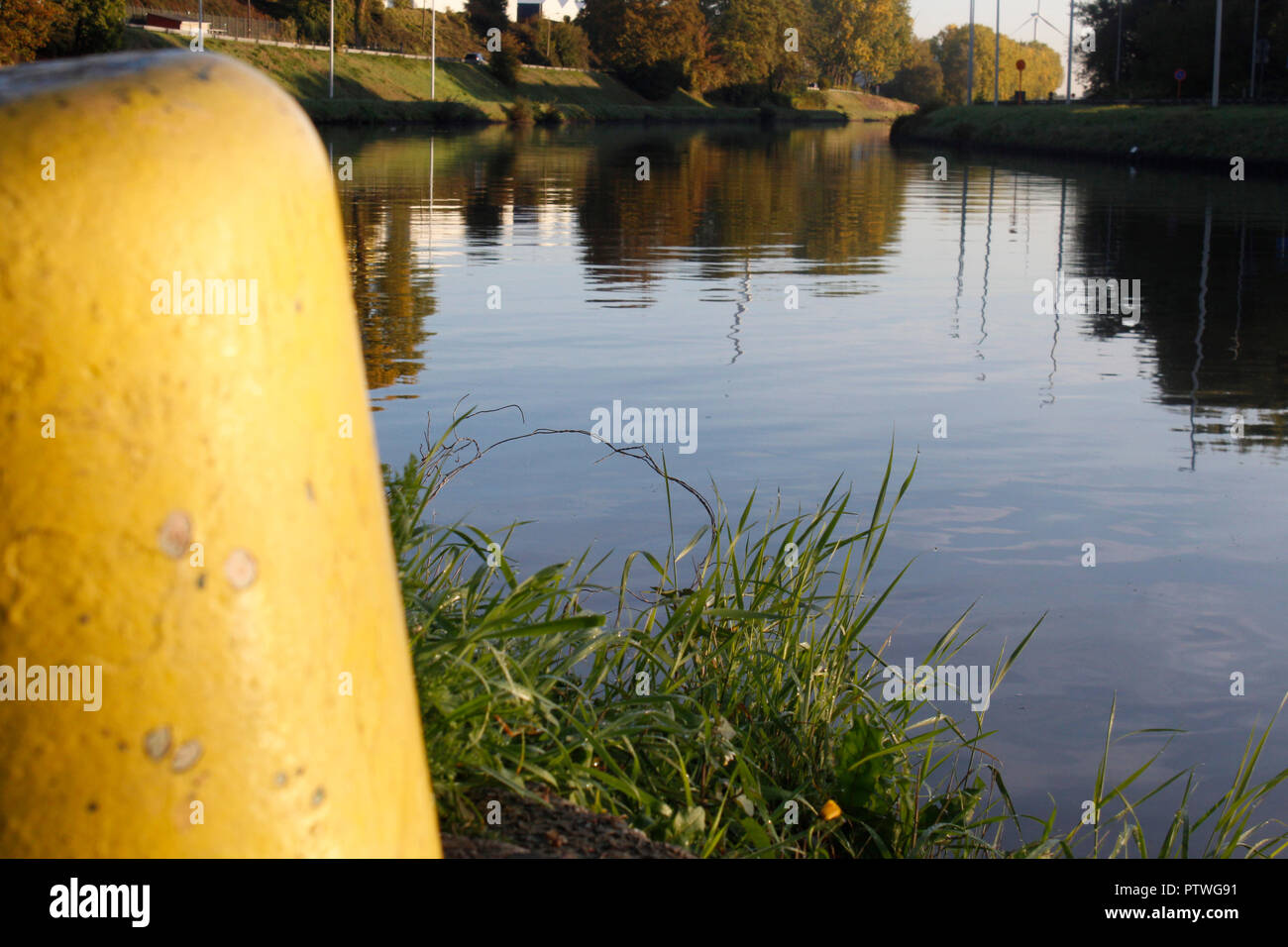 yellow rope pole on the side of the cannel Stock Photo - Alamy