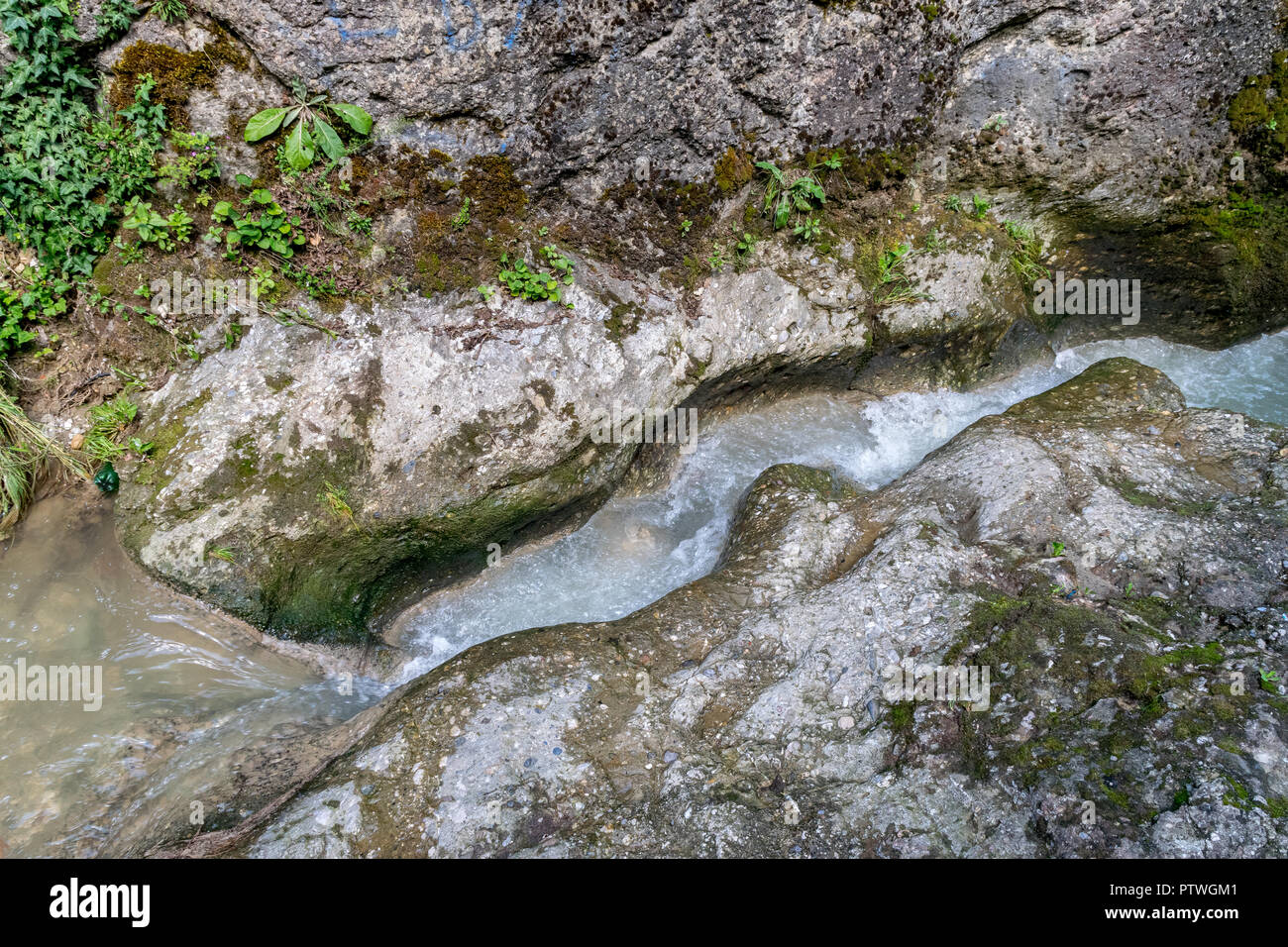 Small mountain river flow throught rocks Stock Photo - Alamy