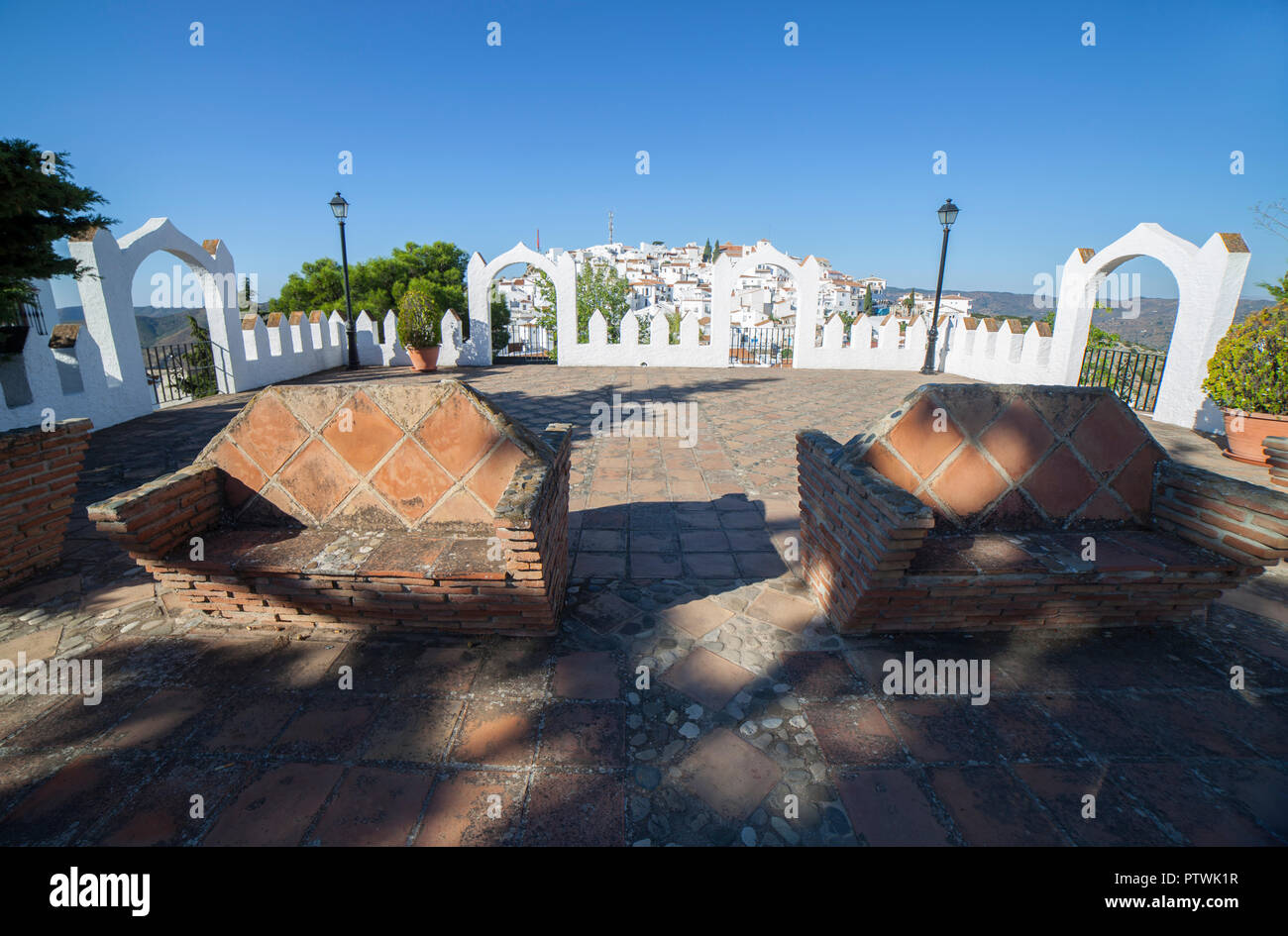 Comares cityscape. White village up on the hill of Malaga mountains ...