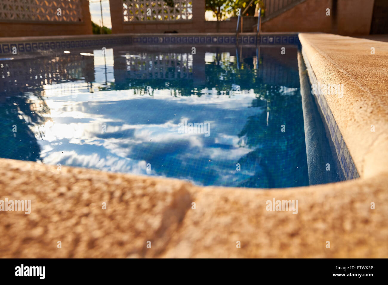 poolside with clear blue water Stock Photo - Alamy