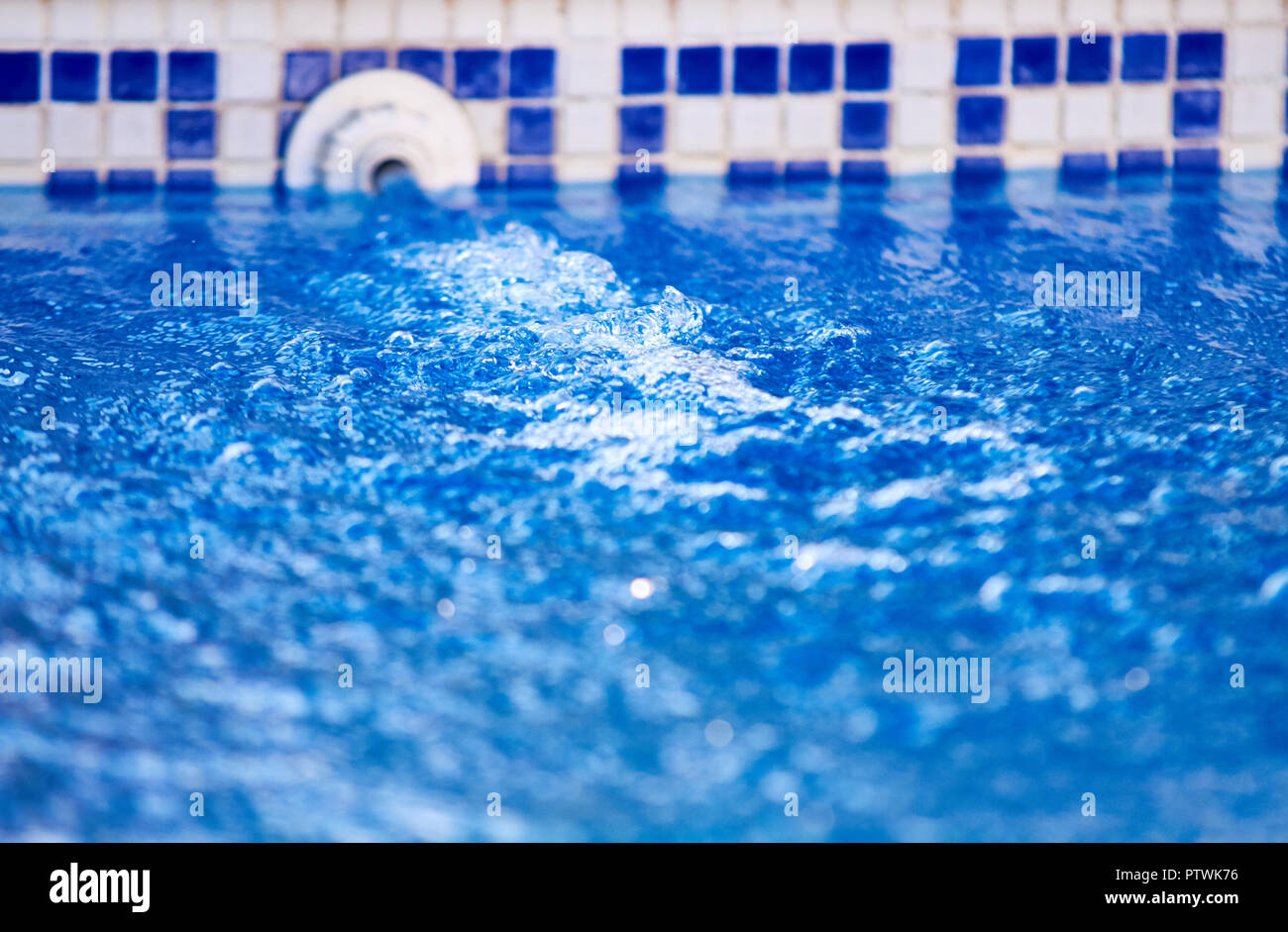 poolside with clear blue water Stock Photo - Alamy