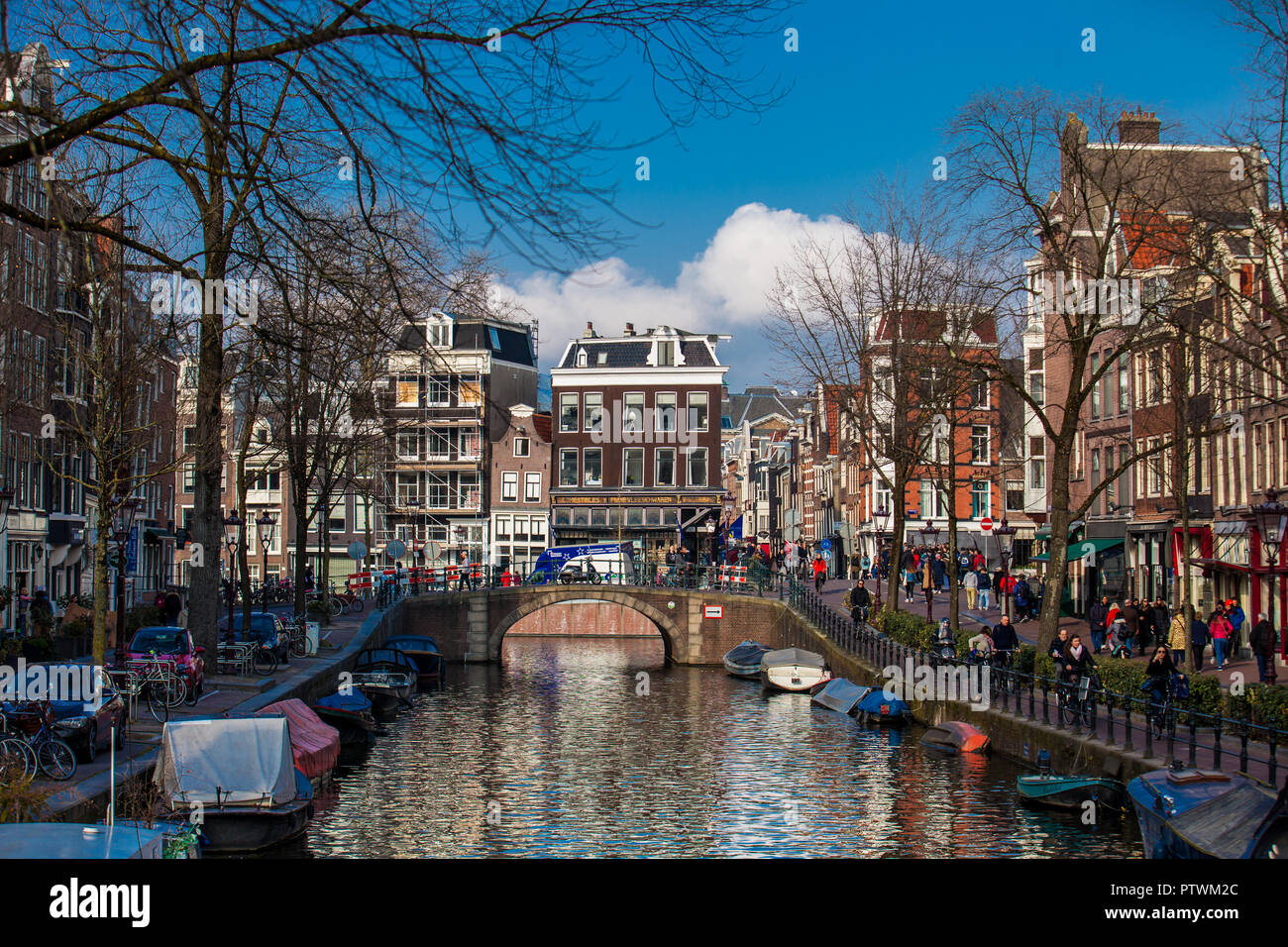 Canals, boats and beautiful architecture at the Old Central district in ...