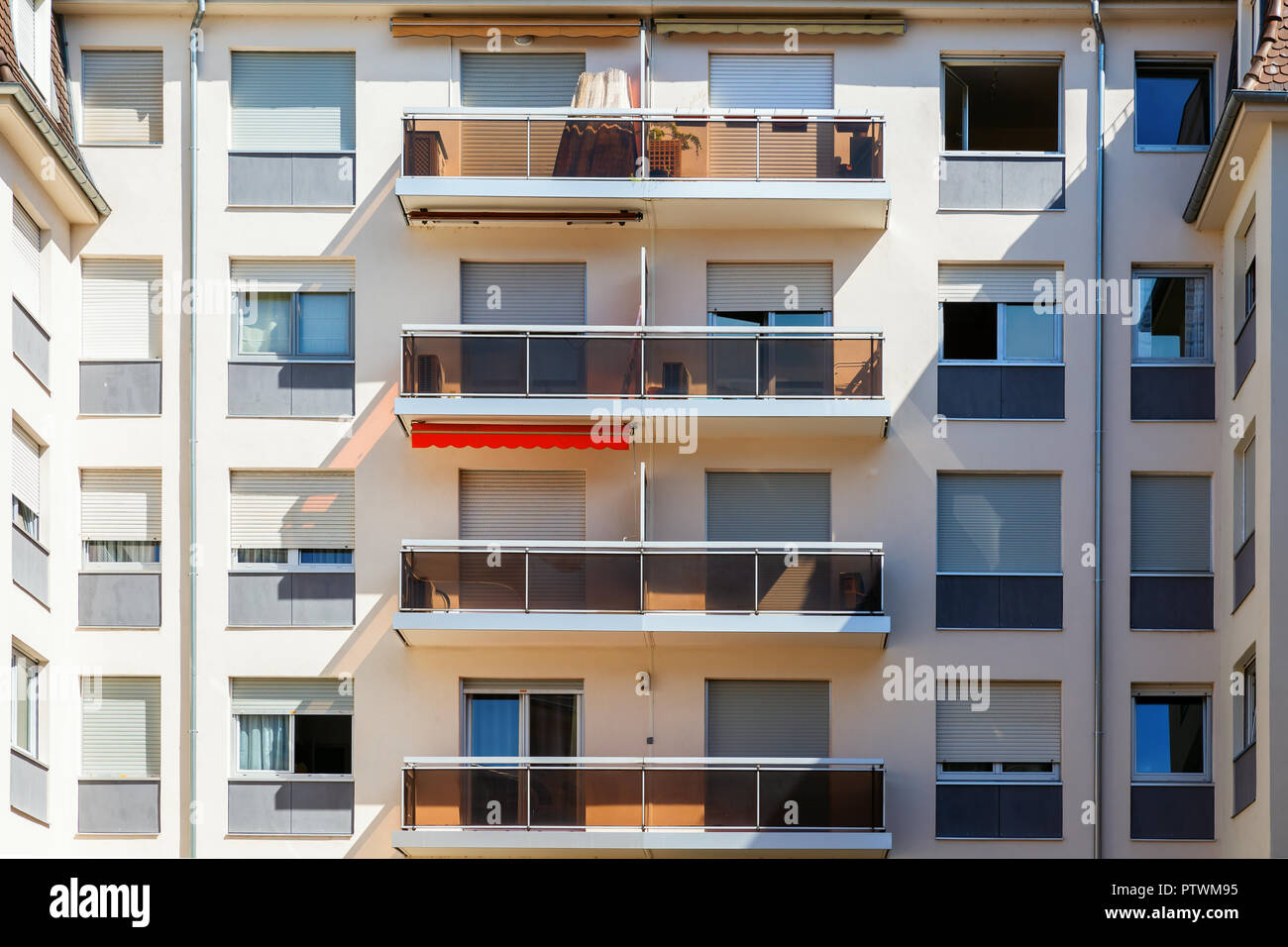 picture of a window front of a housing complex Stock Photo - Alamy