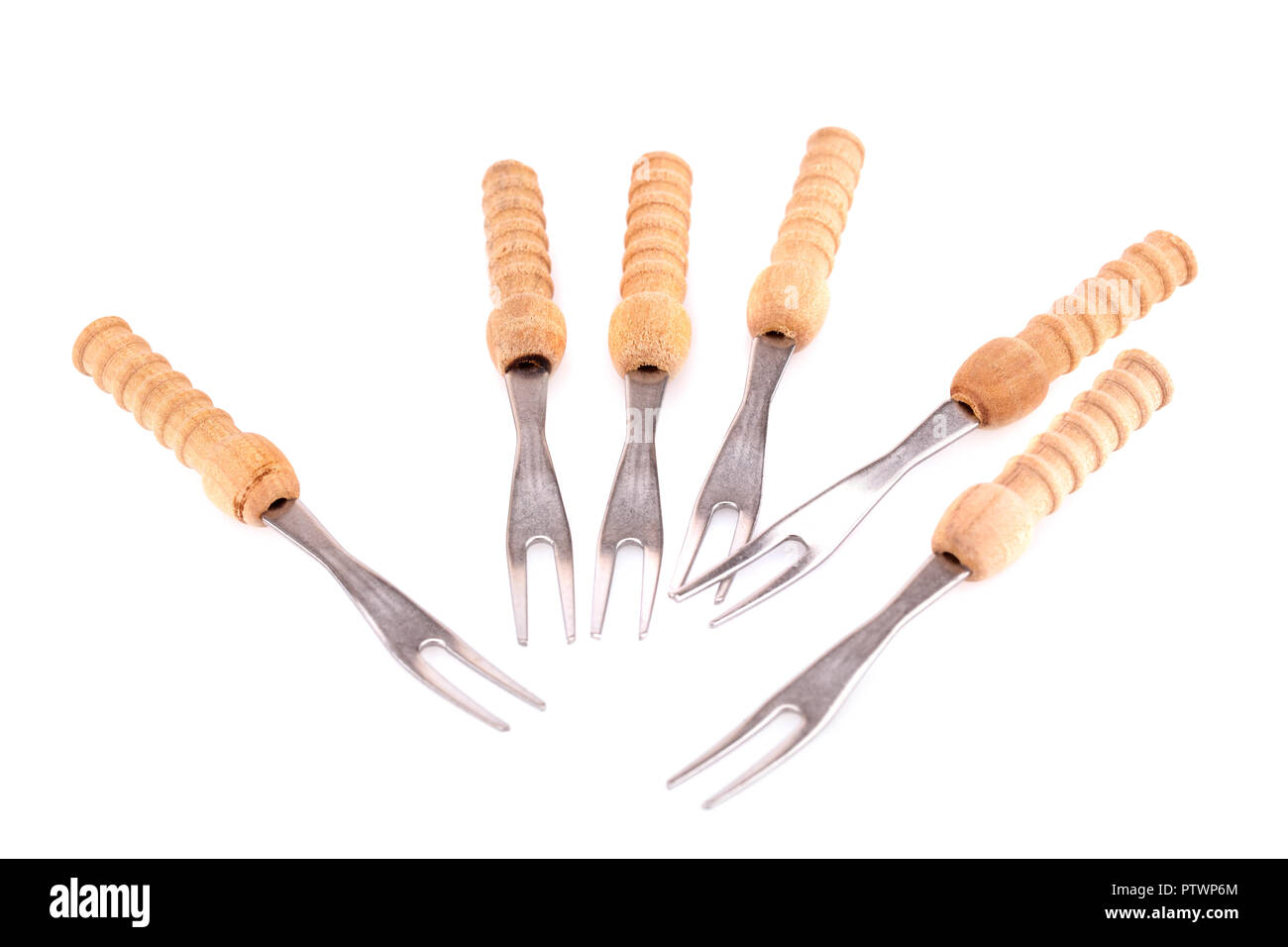 Forks with wooden handles isolated on white background Stock Photo - Alamy