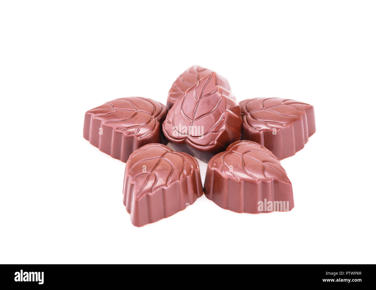 Heap of chocolate isolated on white background Stock Photo - Alamy