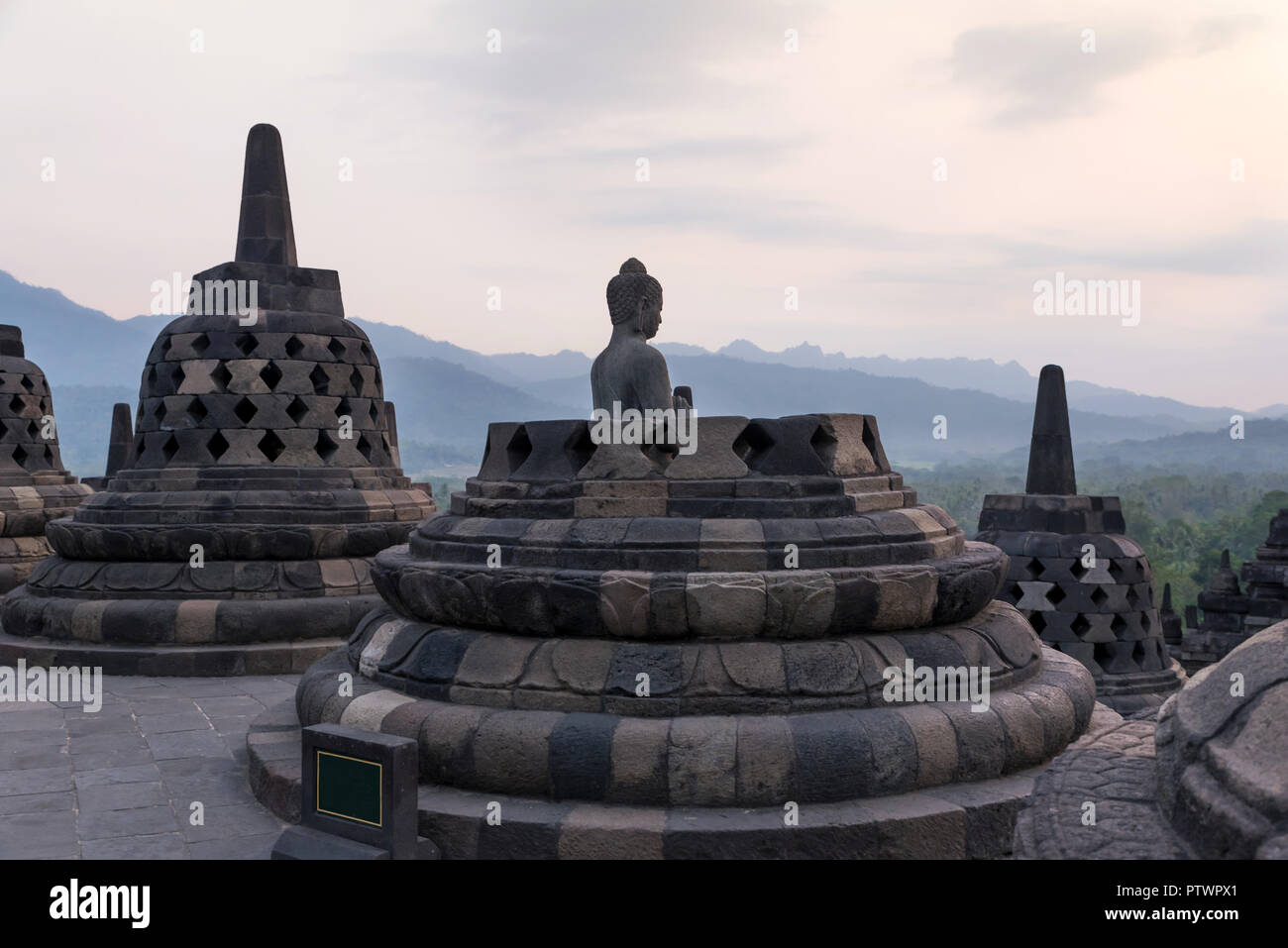 Some stupas of Borobudur temple, a buddhist complex in Java, Indonesia ...