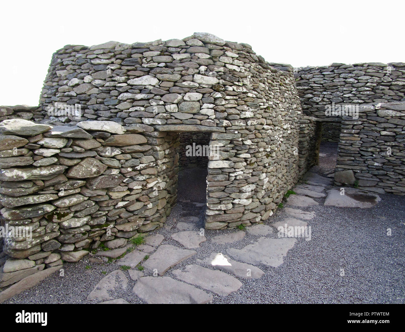 Primitive clochán (beehive hut) dwelling on the Dingle Peninsula in ...