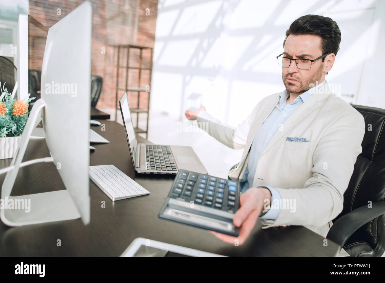 Man behind office desk studying hi-res stock photography and images - Alamy