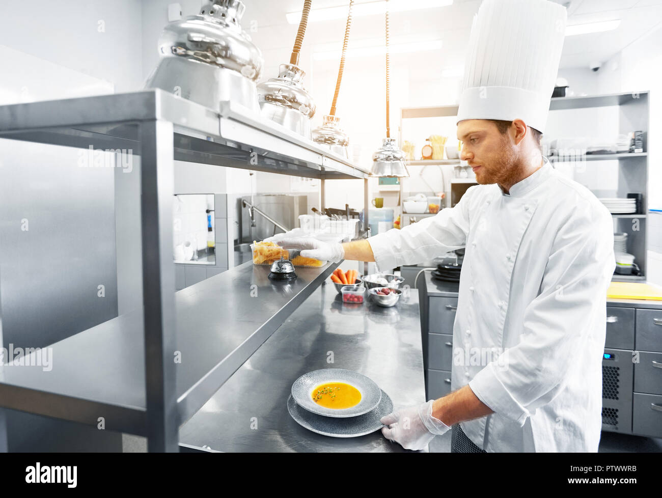 happy male chef cooking food at restaurant kitchen Stock Photo - Alamy