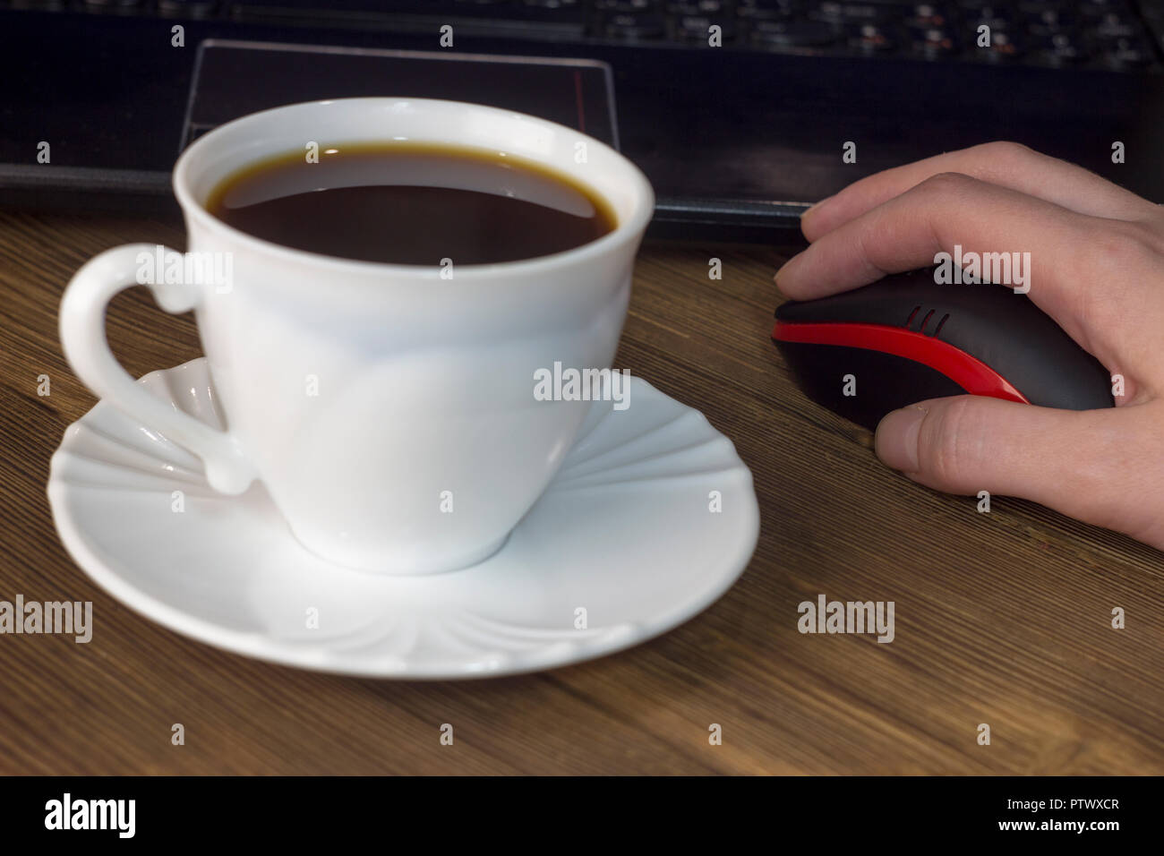 Female hand holding computer mouse hi-res stock photography and images ...