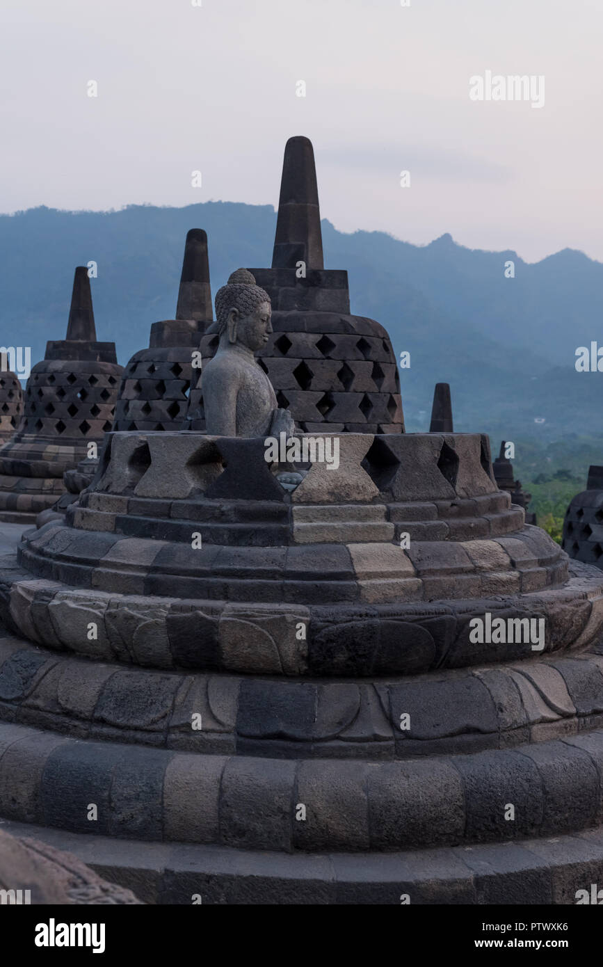 Some stupas of Borobudur temple, a buddhist complex in Java, Indonesia ...