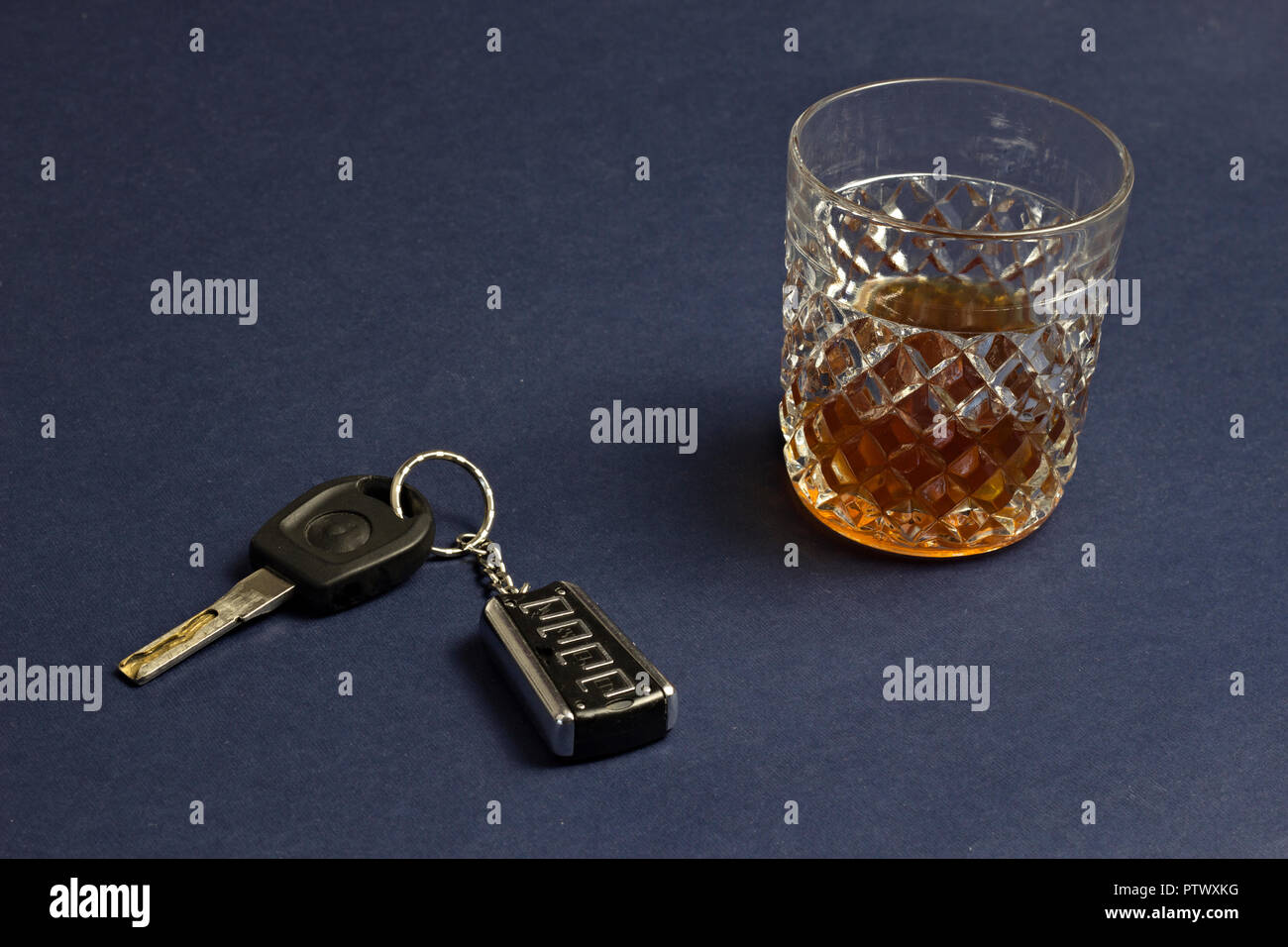 Car keys and a glass of alcohol Stock Photo - Alamy