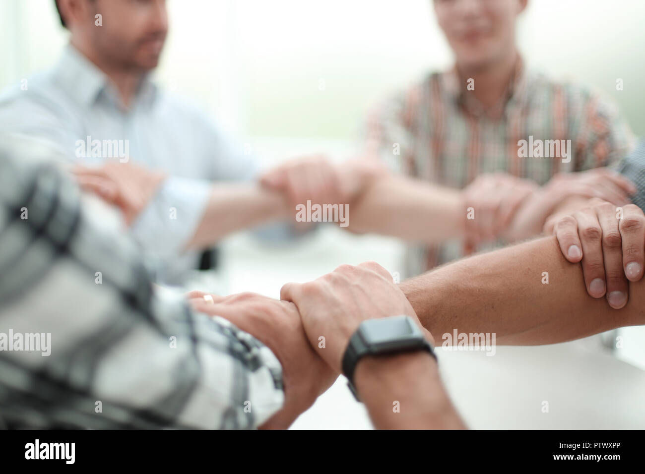 background image.business team standing in a circle Stock Photo - Alamy