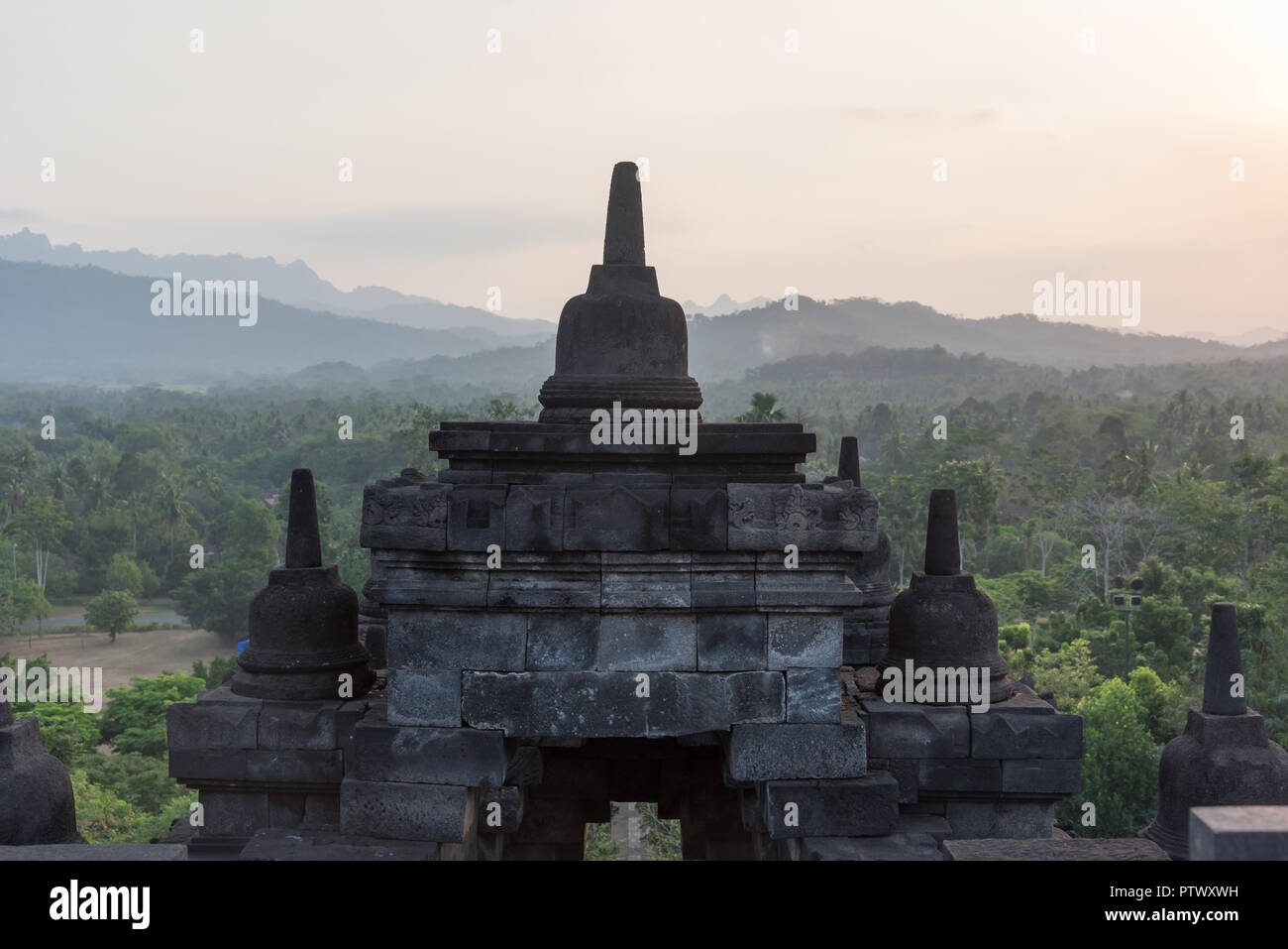 Some stupas of Borobudur temple, a buddhist complex in Java, Indonesia ...
