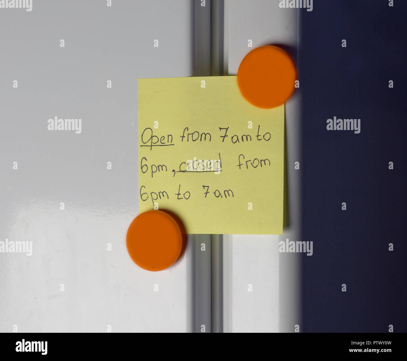 Yellow sticker on the refrigerator door Stock Photo - Alamy