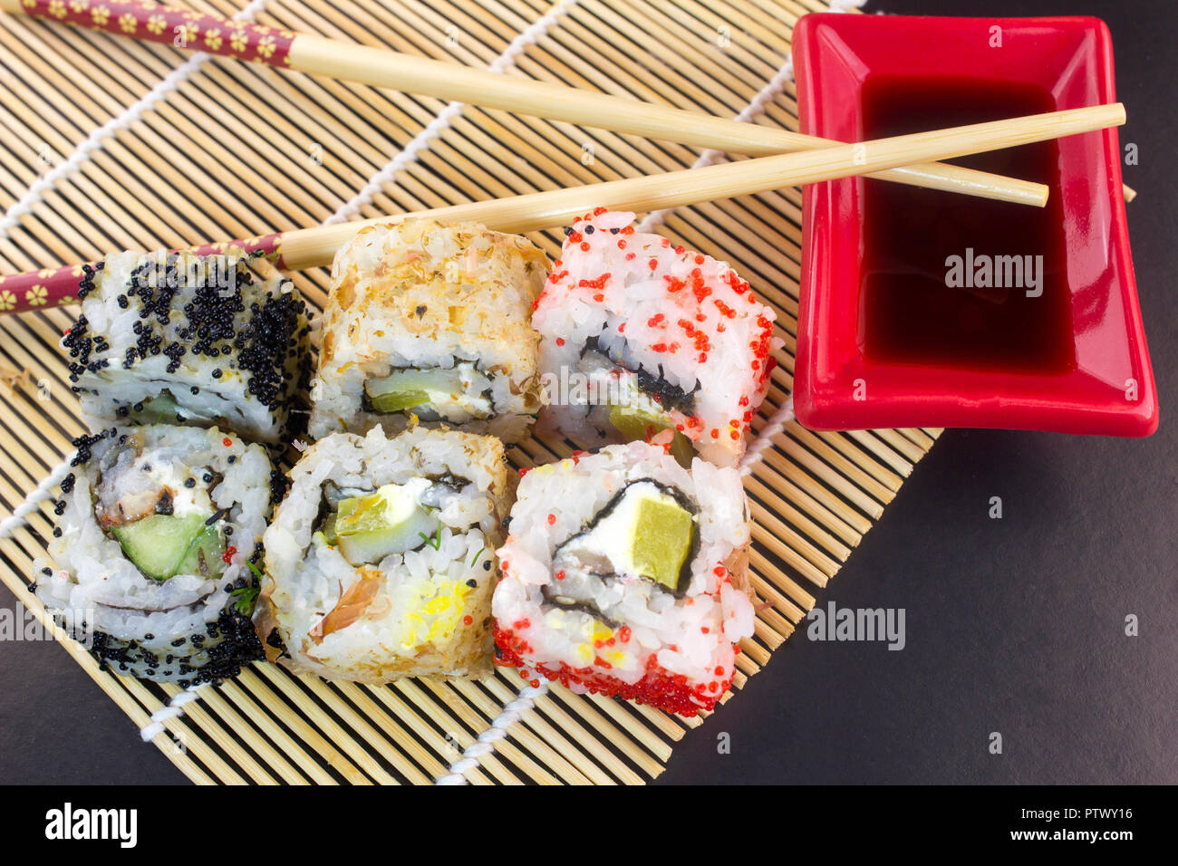 Sushi, sticks and soy sauce Stock Photo - Alamy