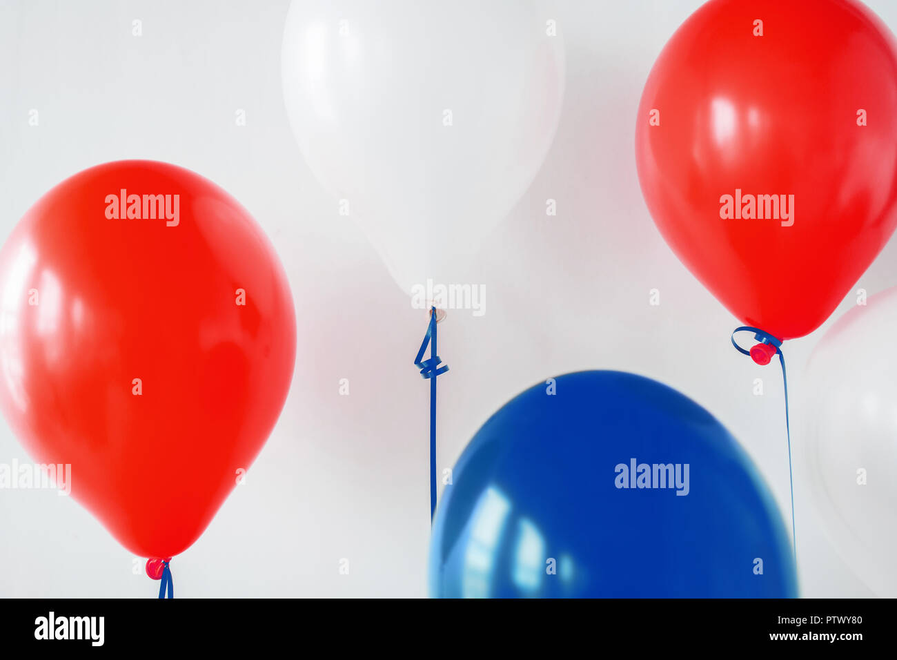 party decoration with red, white and blue balloons Stock Photo - Alamy