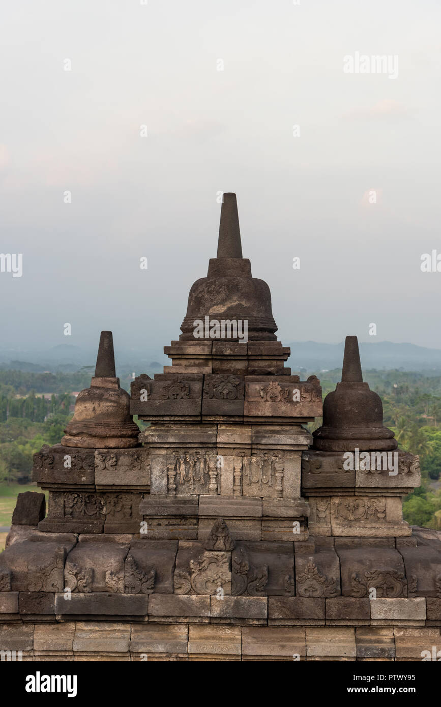 Some stupas of Borobudur temple, a buddhist complex in Java, Indonesia ...