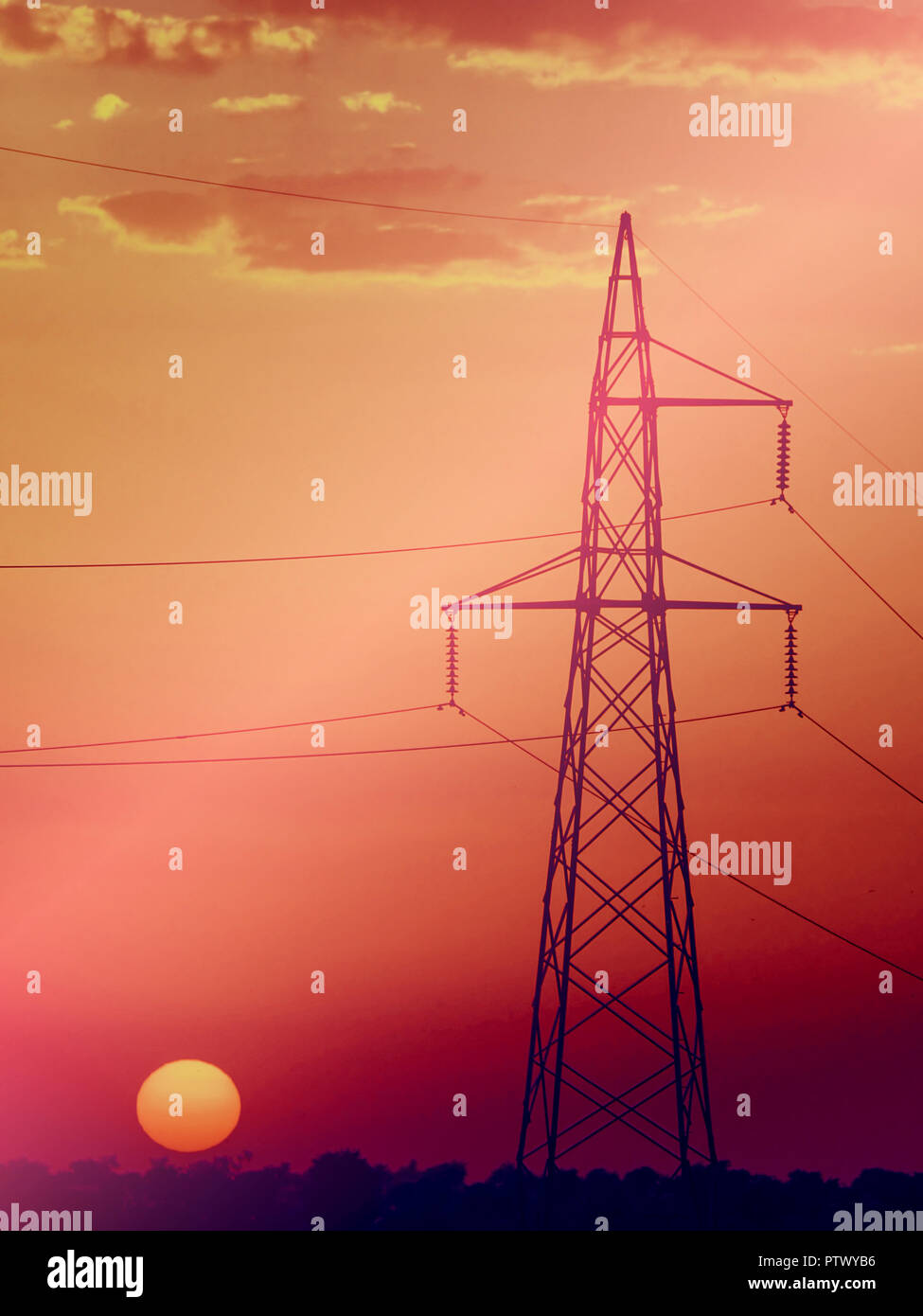 Electricity pylon at sunset in India, Rajasthan province Stock Photo ...