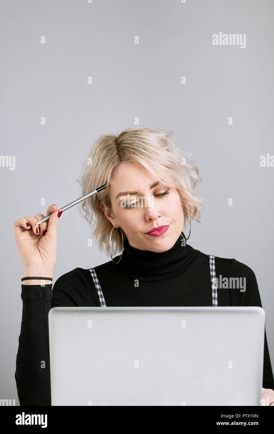 Deep thinking student hi-res stock photography and images - Alamy