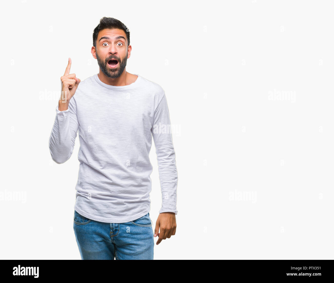 Adult hispanic man over isolated background pointing finger up with ...