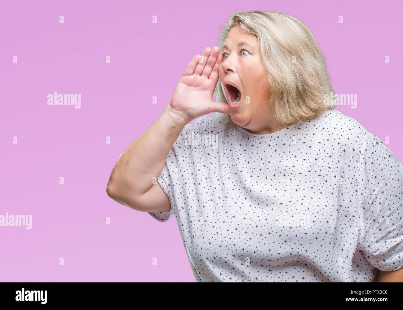 Senior plus size caucasian woman over isolated background shouting and ...
