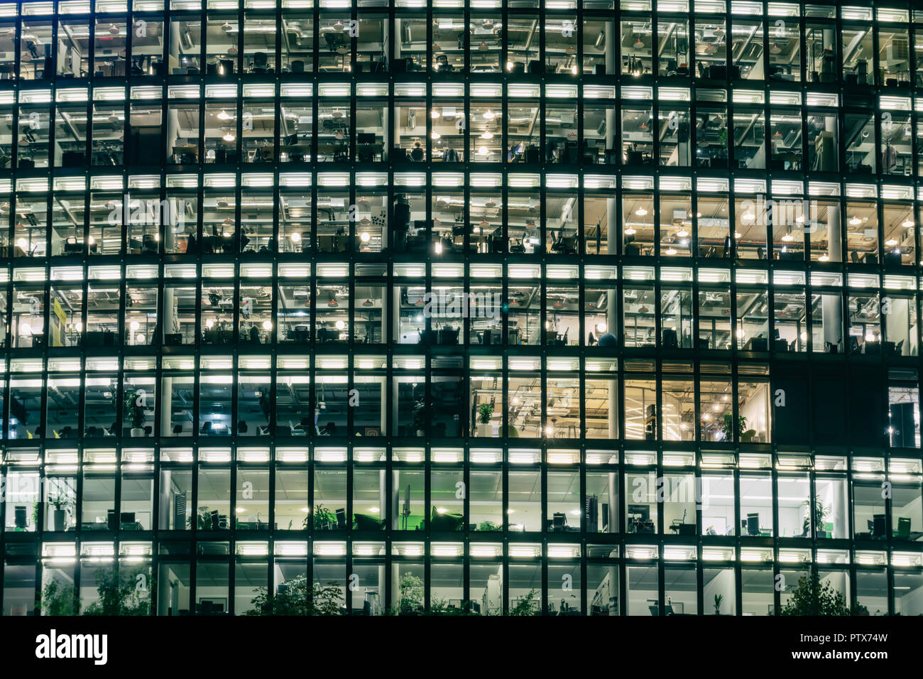 Office building facade night people hi-res stock photography and images ...