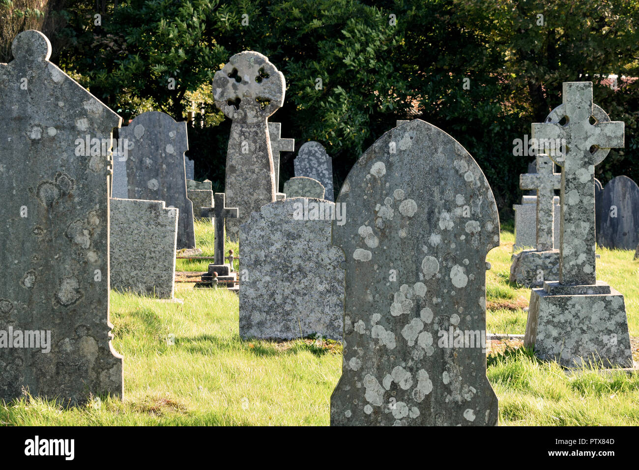 Gravestones in a cemetery hi-res stock photography and images - Alamy