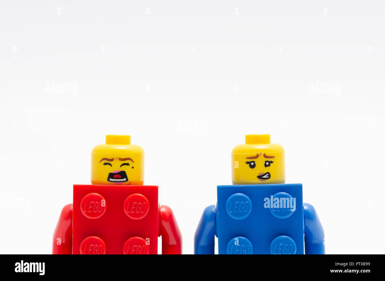 Two Lego minifigures - one scared and one happy. Lego minifigures are ...