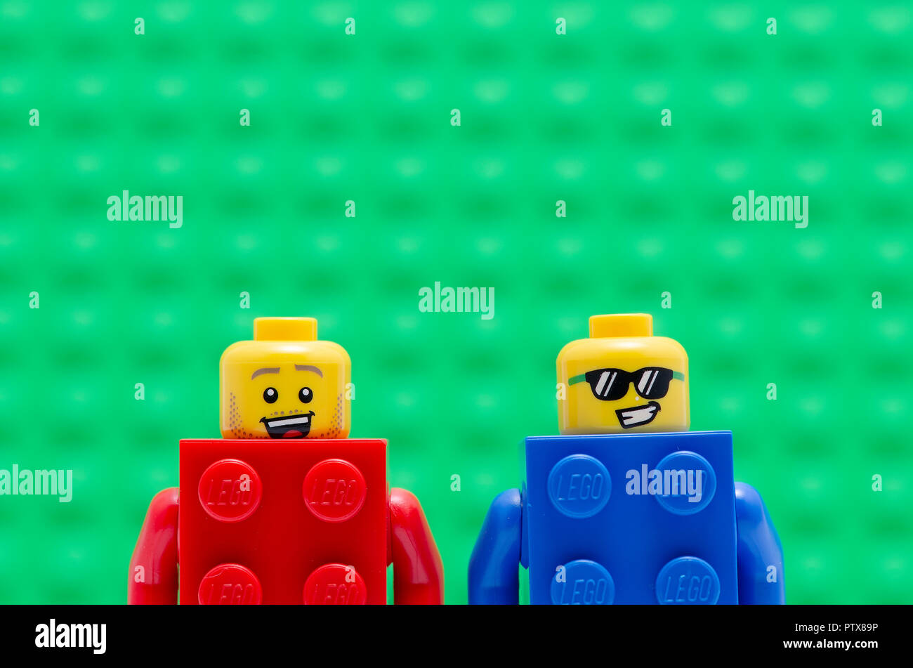 Two Lego minifigures - one scared and one wearing sunglasses Stock ...