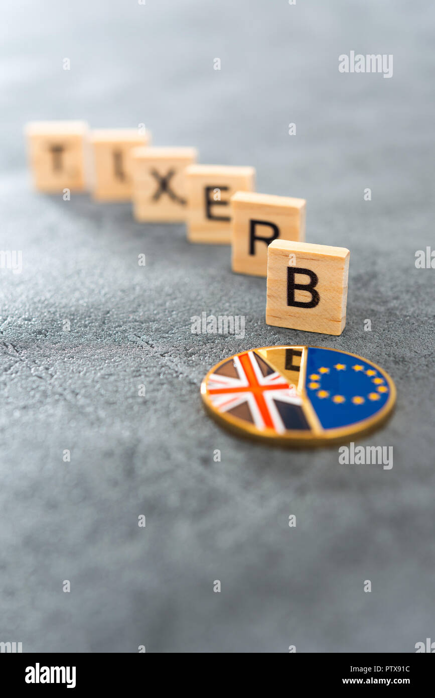 Brexit Concept - National Flag Gold Coin and English Words Stock Photo ...