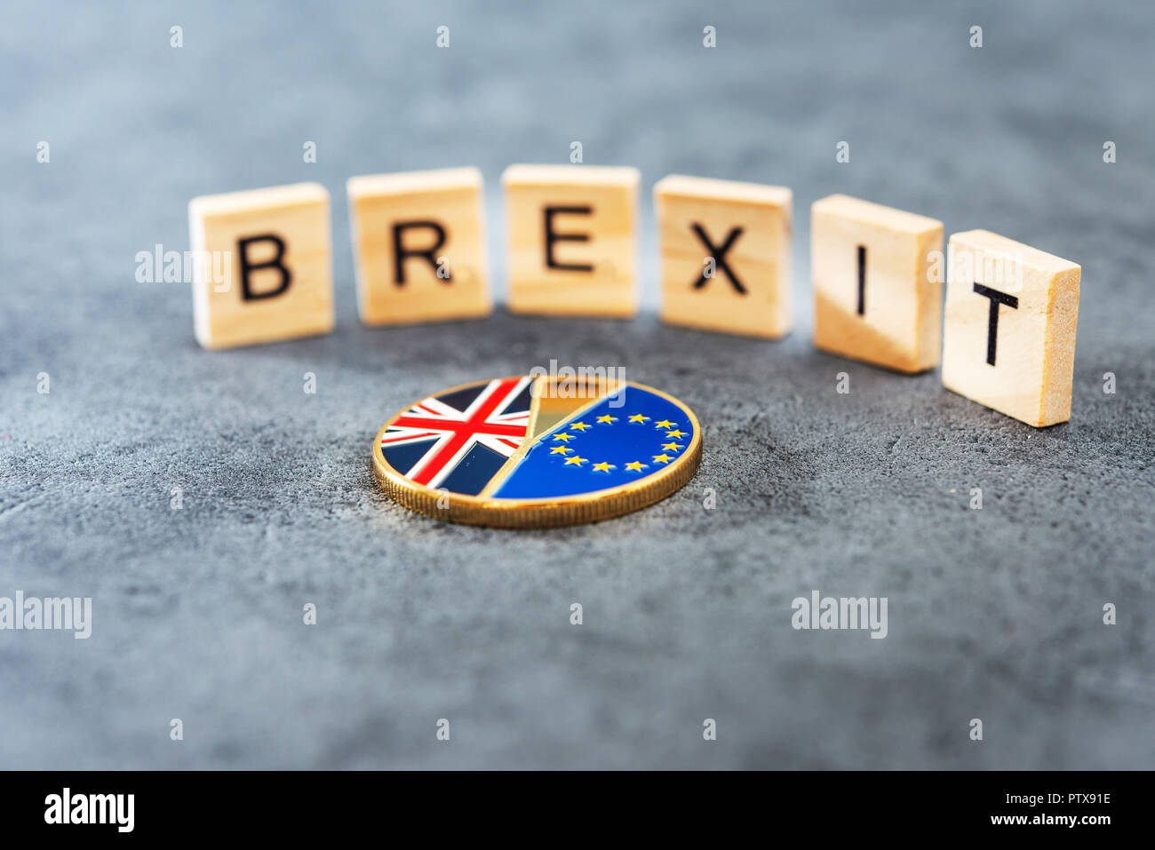 Brexit Concept - National Flag Gold Coin and English Words Stock Photo ...