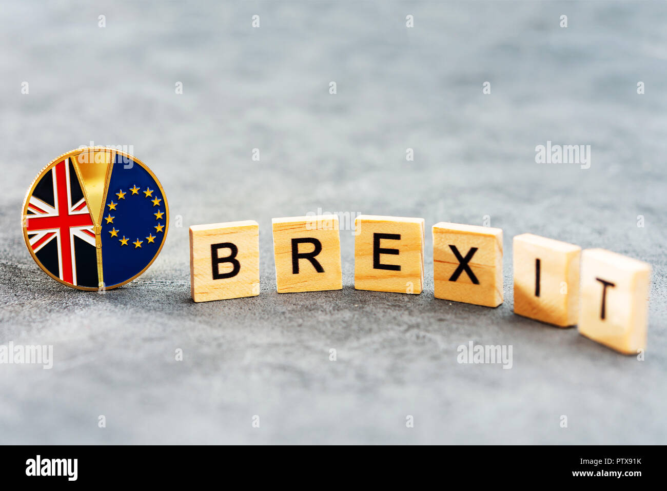 Brexit Concept - National Flag Gold Coin and English Words Stock Photo ...