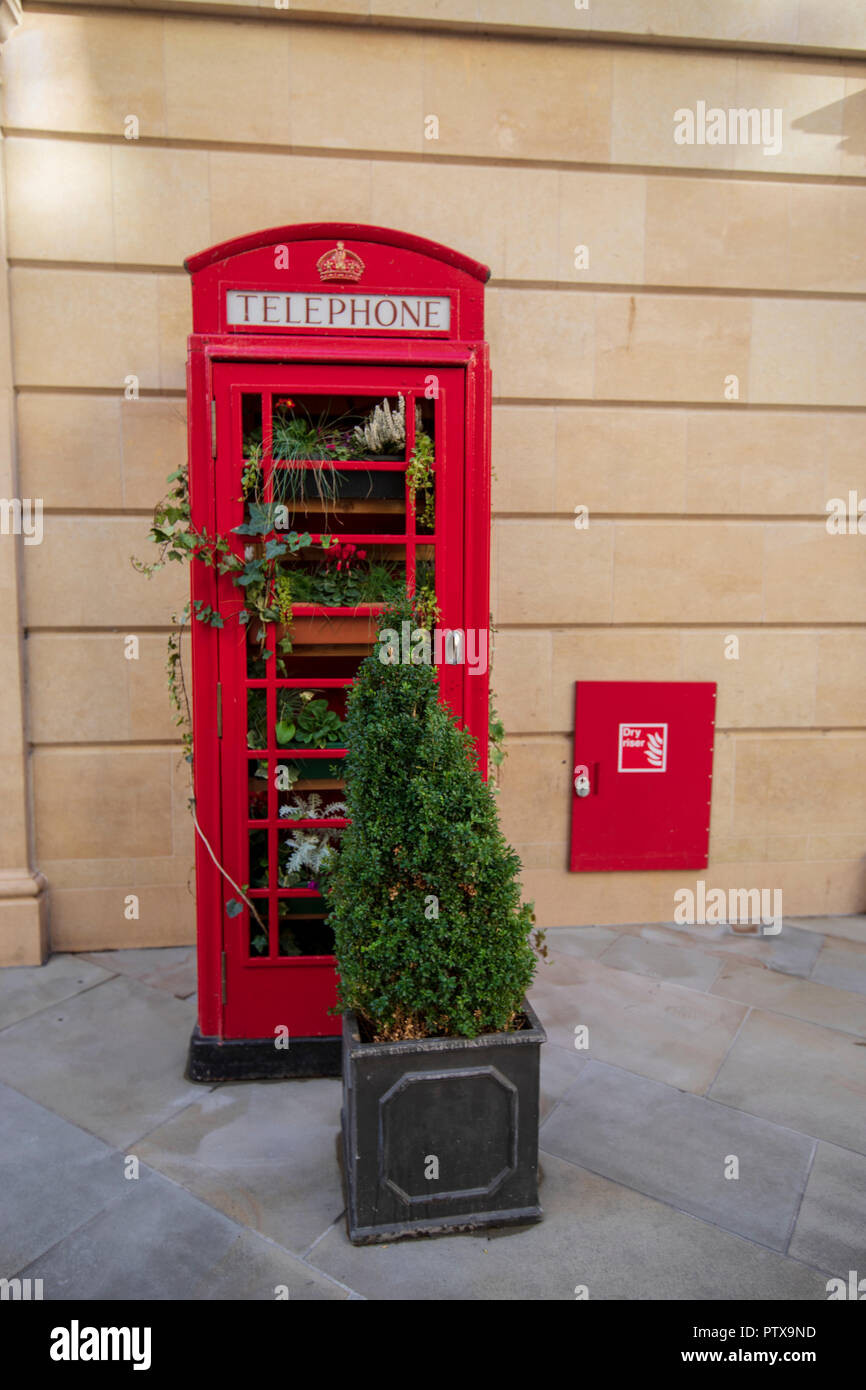 Telephone box planter hi-res stock photography and images - Alamy