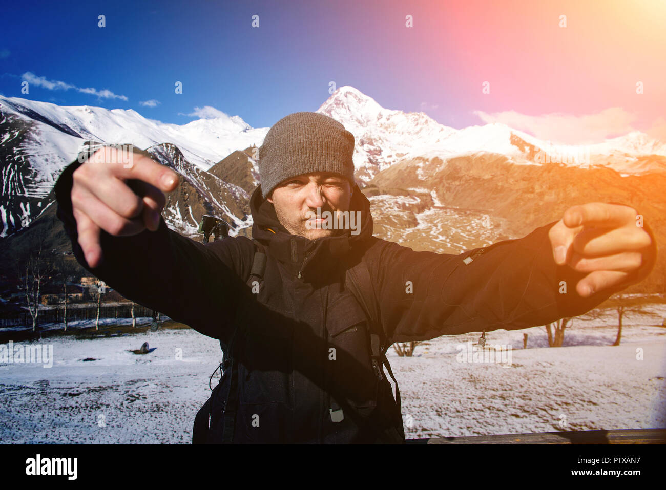 coolest man on the background of mountains Stock Photo - Alamy