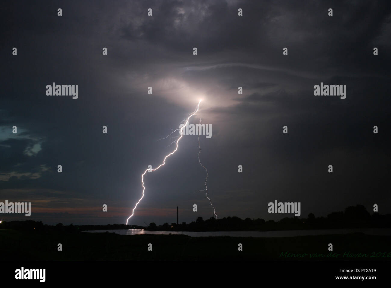 Lightning strikes outside the storm Stock Photo - Alamy