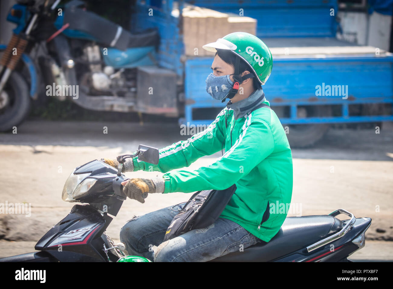 Ho Chi Minh City, Vietnam - September 27, 2018: Grab driver on the ...