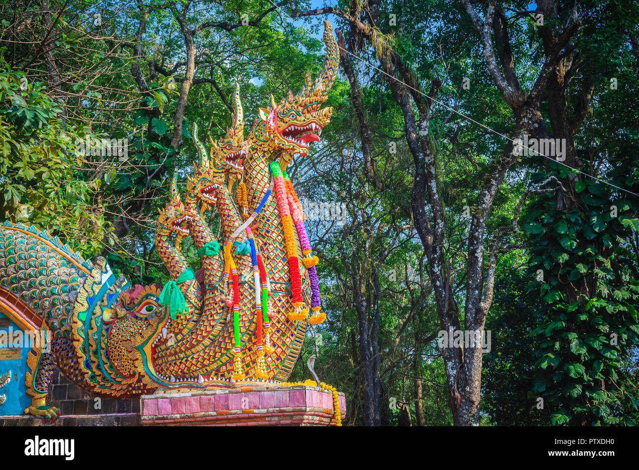 Beautiful naga statue at the staircase leading to the temple of Wat ...