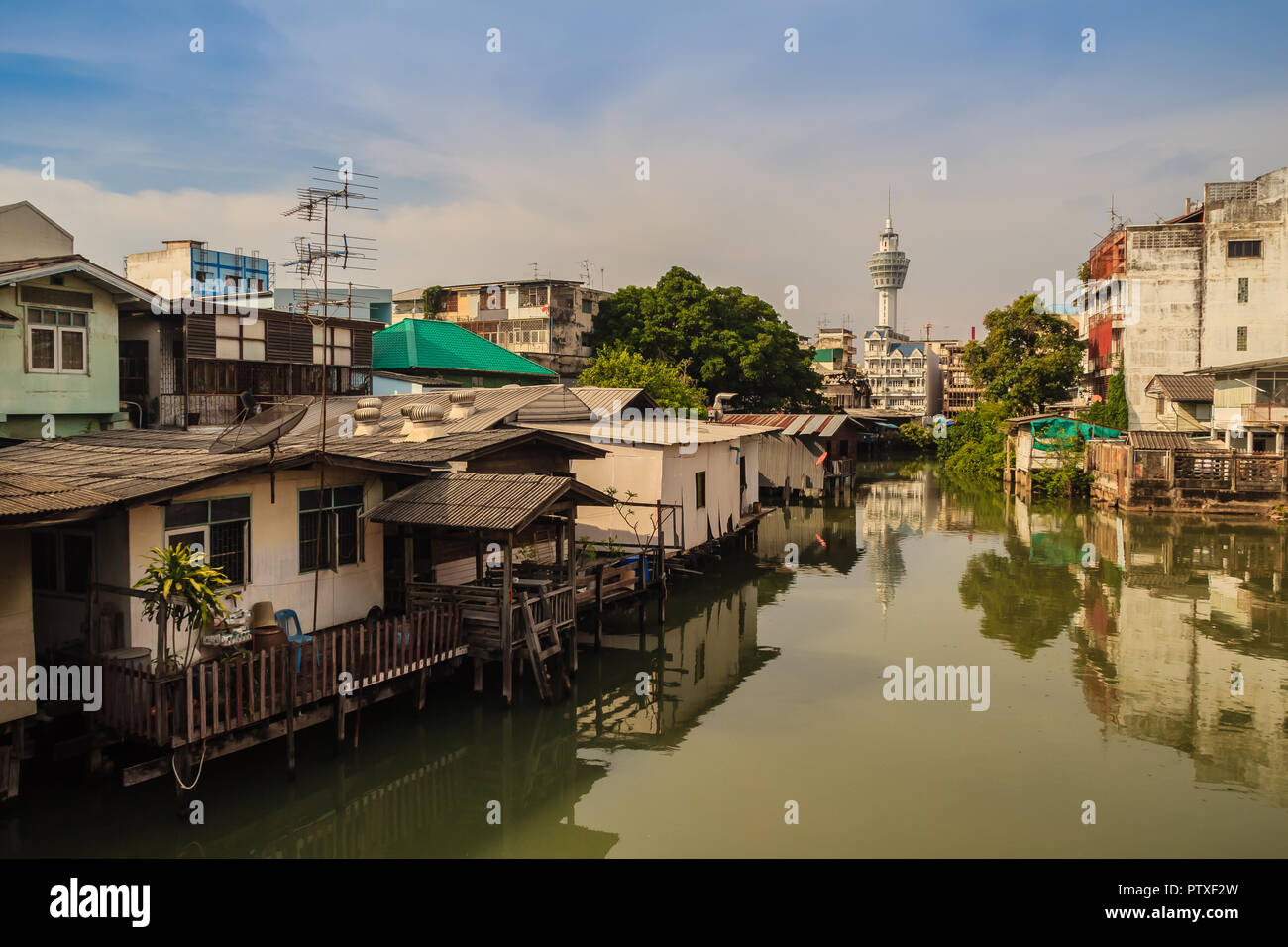 Samut Prakarn observation tower with canal and village in foreground ...