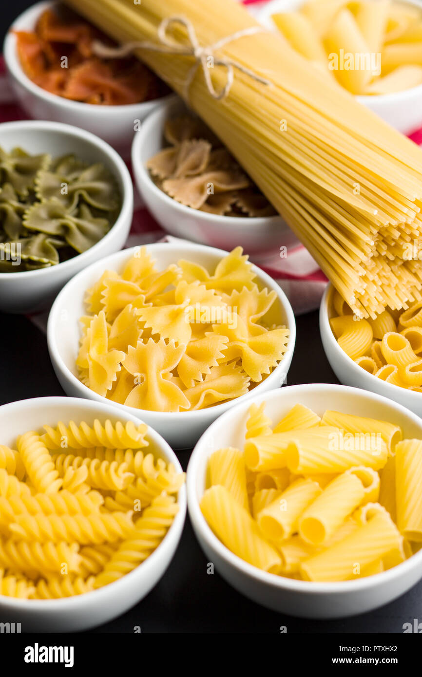 Various types of italian pasta in bowl Stock Photo - Alamy