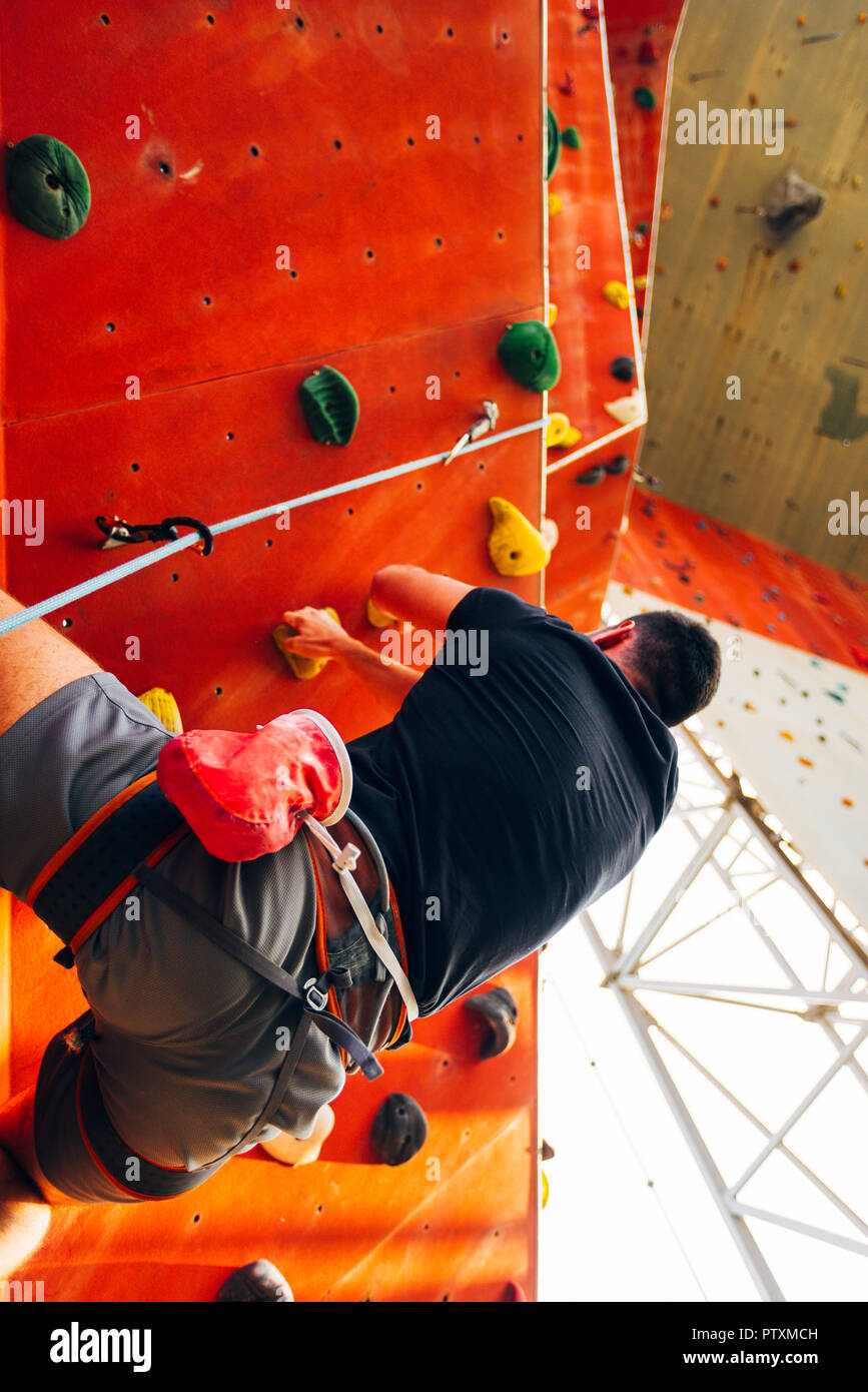 Active lifestyle and bouldering climbing, reaching the top concept ...