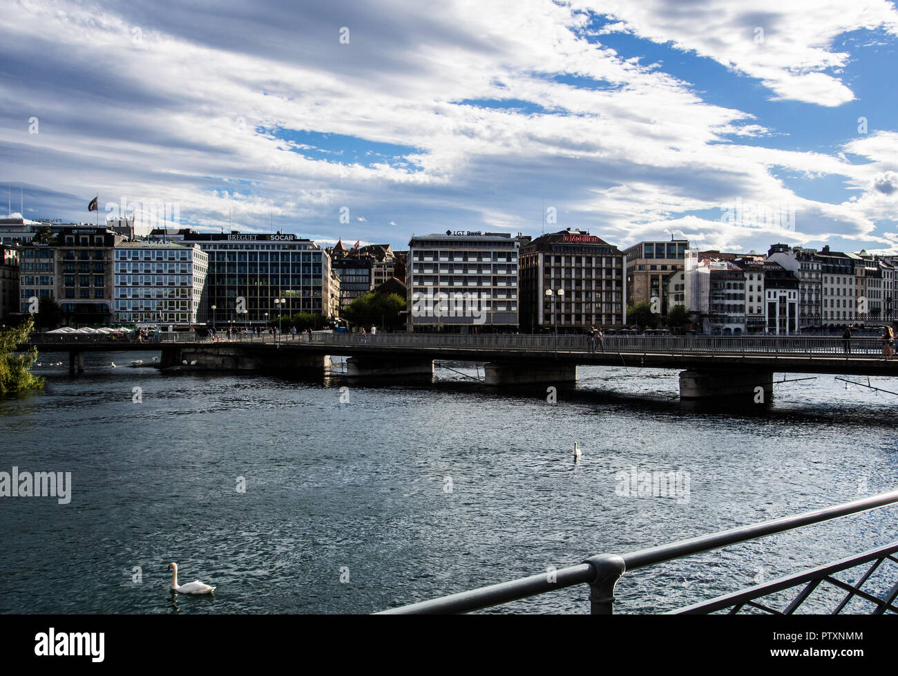 Office buildings of the Rhone River, Geneva Stock Photo - Alamy