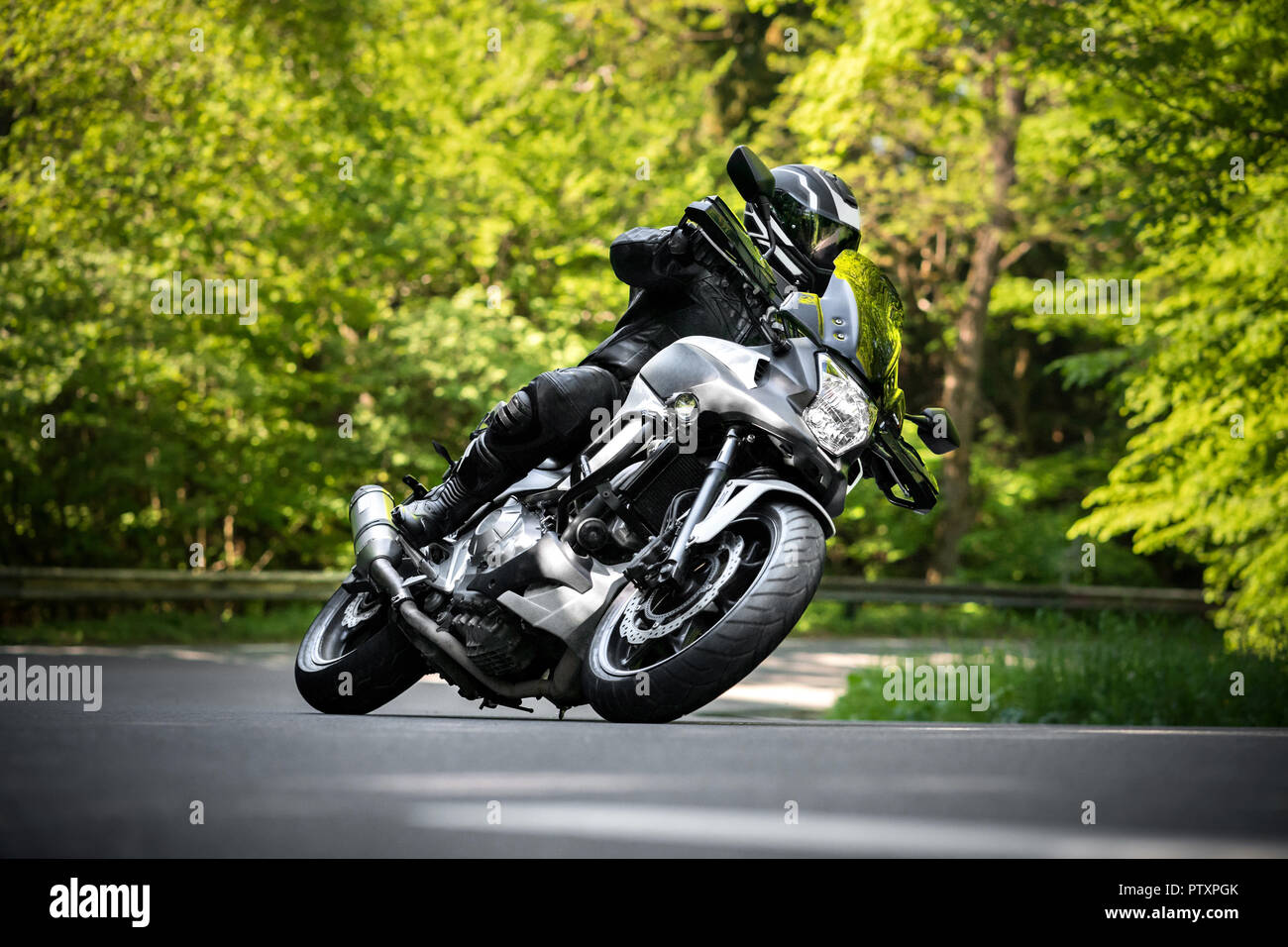 Motorcyclist in curve hi-res stock photography and images - Alamy
